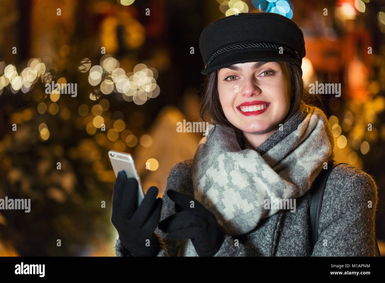 Pretty Girl Uses Smartphone Stock Photo - Alamy