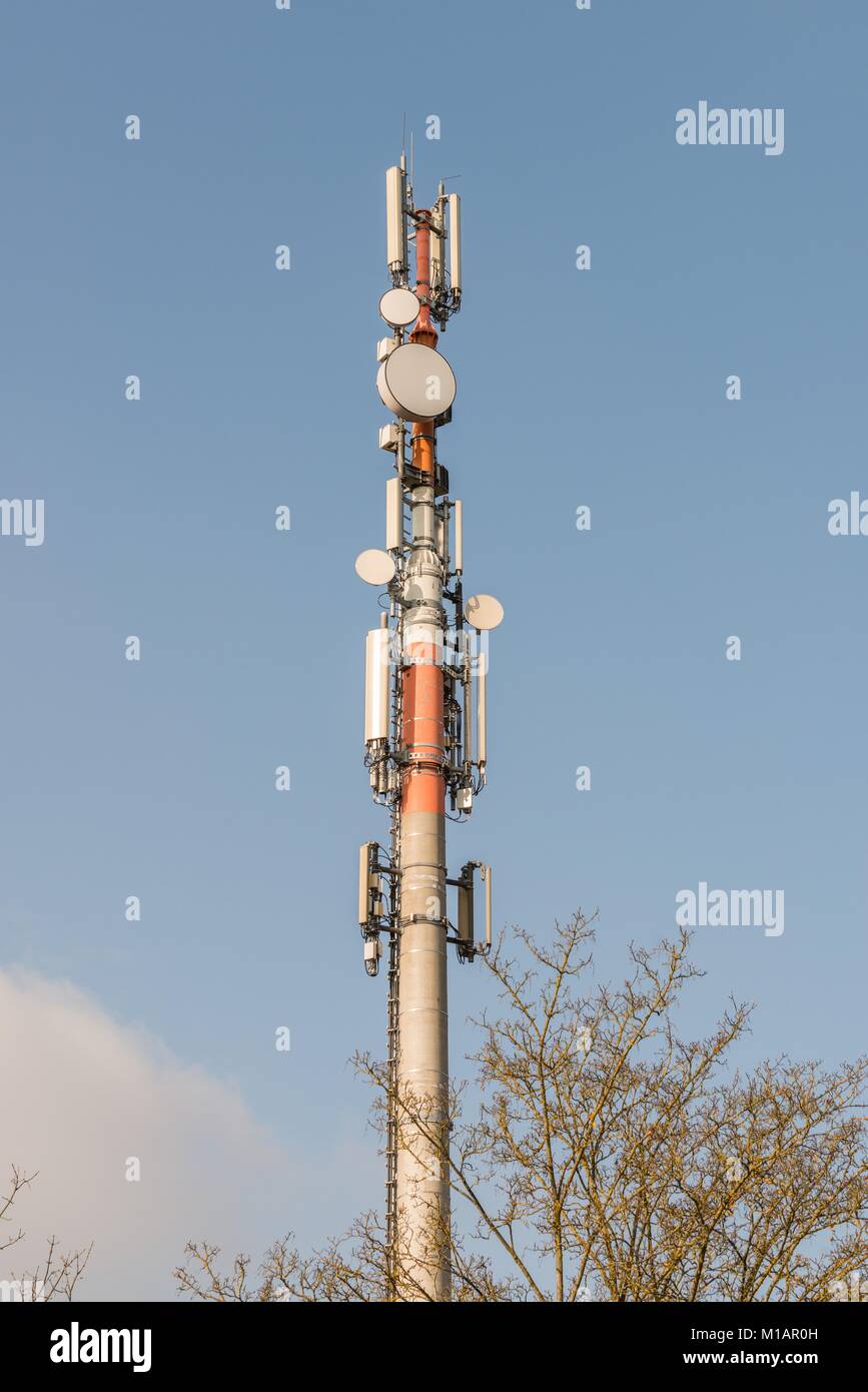 Mobile Cell tower in front of blue sky, Germany Stock Photo - Alamy