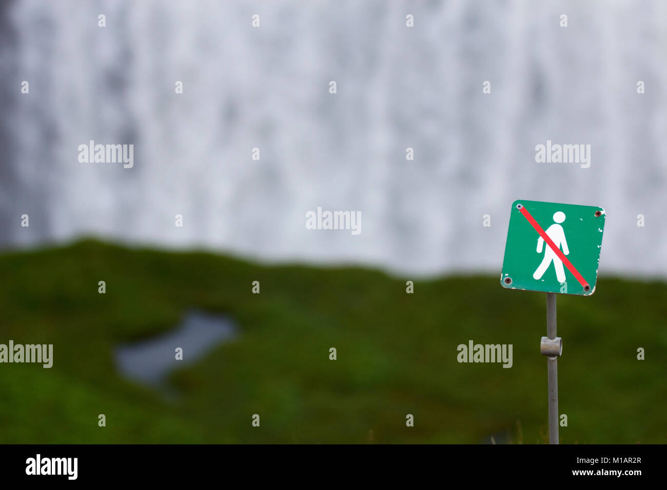 Warning sign at Gullfoss waterfall Stock Photo - Alamy