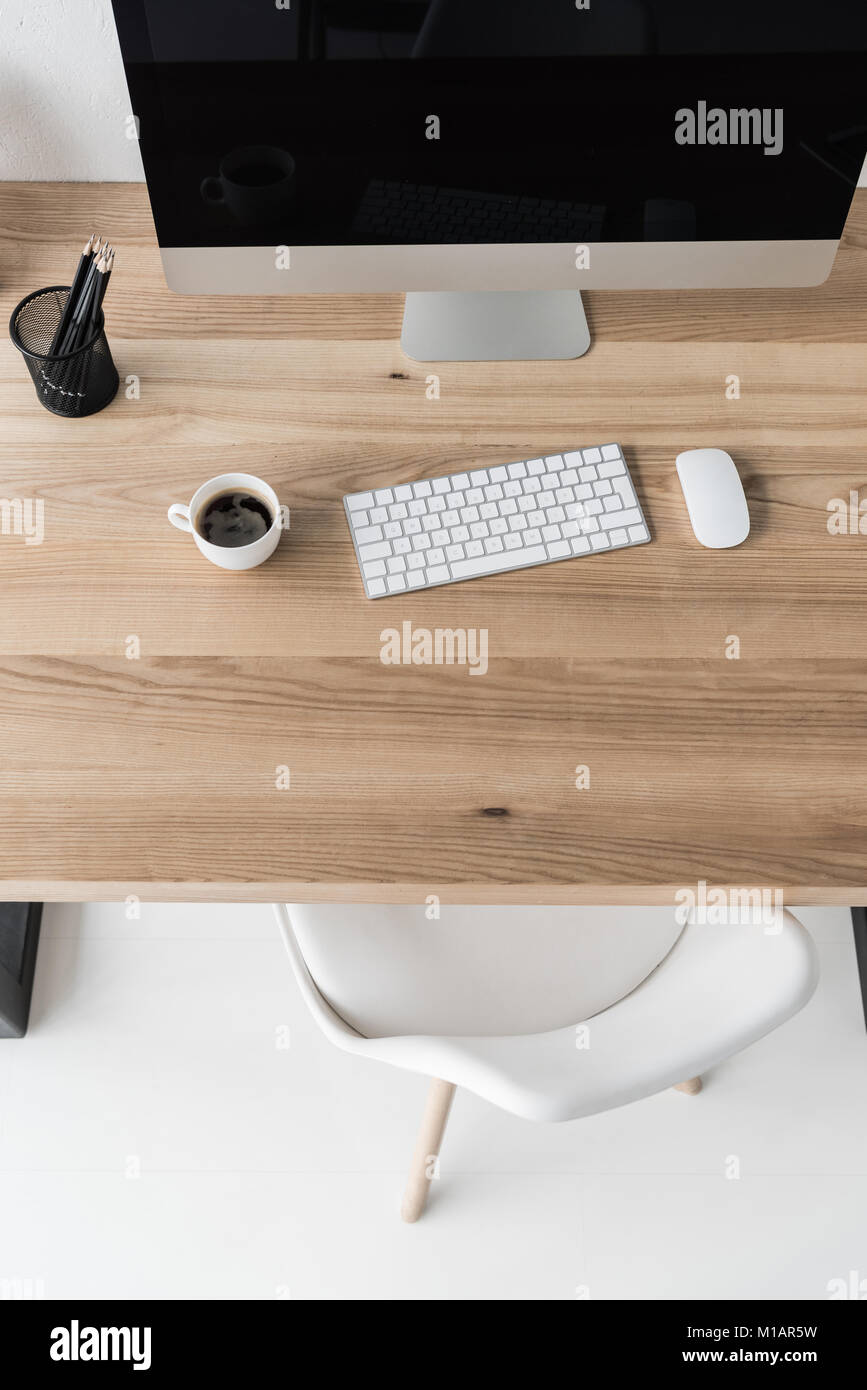 workplace with computer in modern office Stock Photo - Alamy