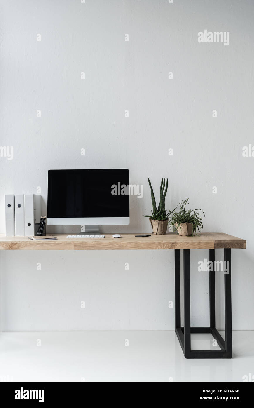 workplace with computer in modern office Stock Photo - Alamy