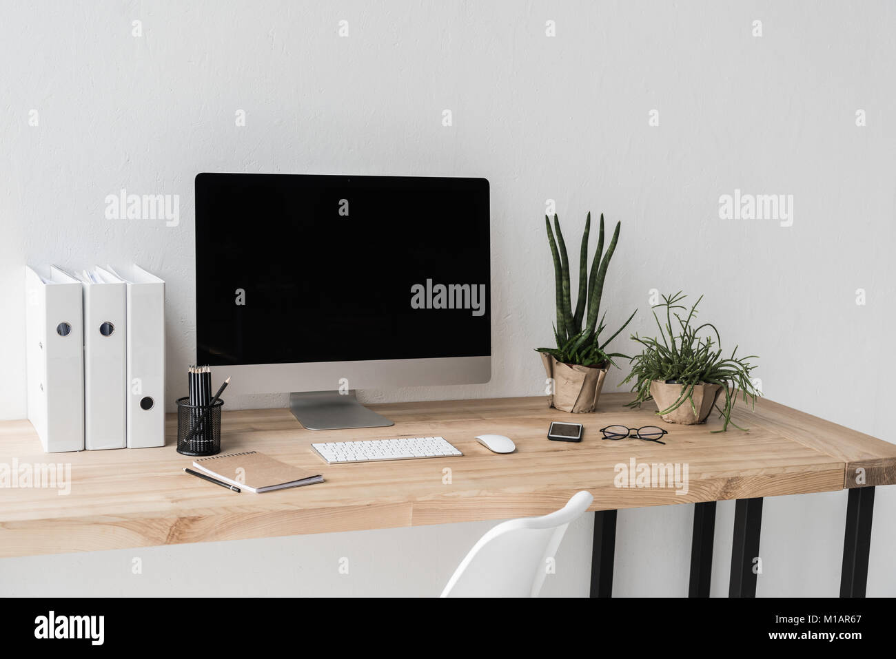workplace with computer in modern office Stock Photo - Alamy