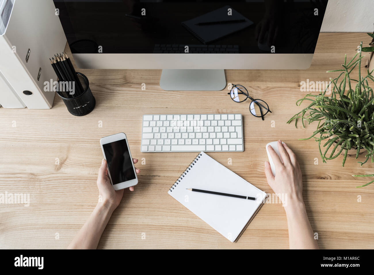 woman using computer at workplace Stock Photo - Alamy