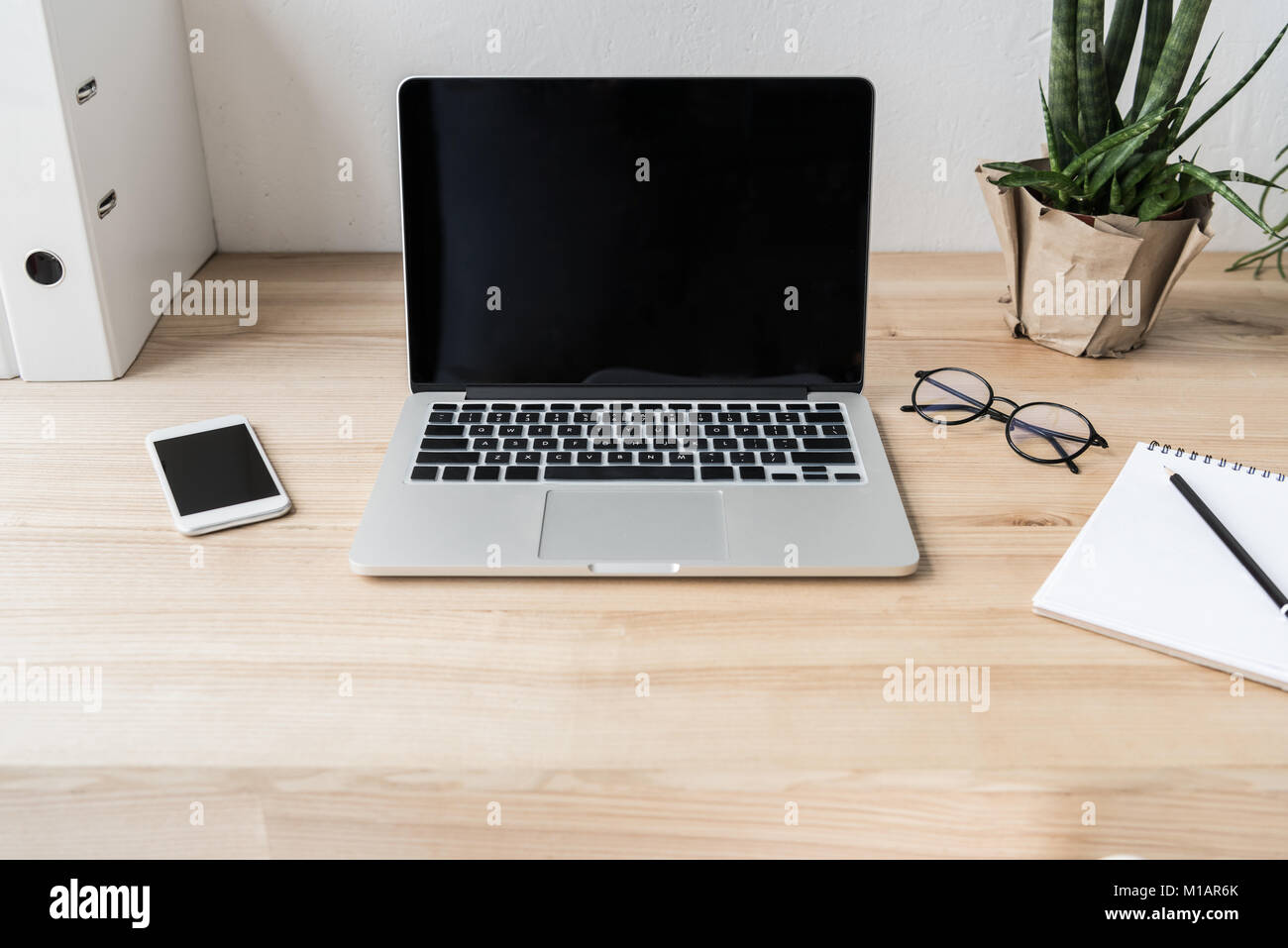 workplace with laptop computer Stock Photo - Alamy