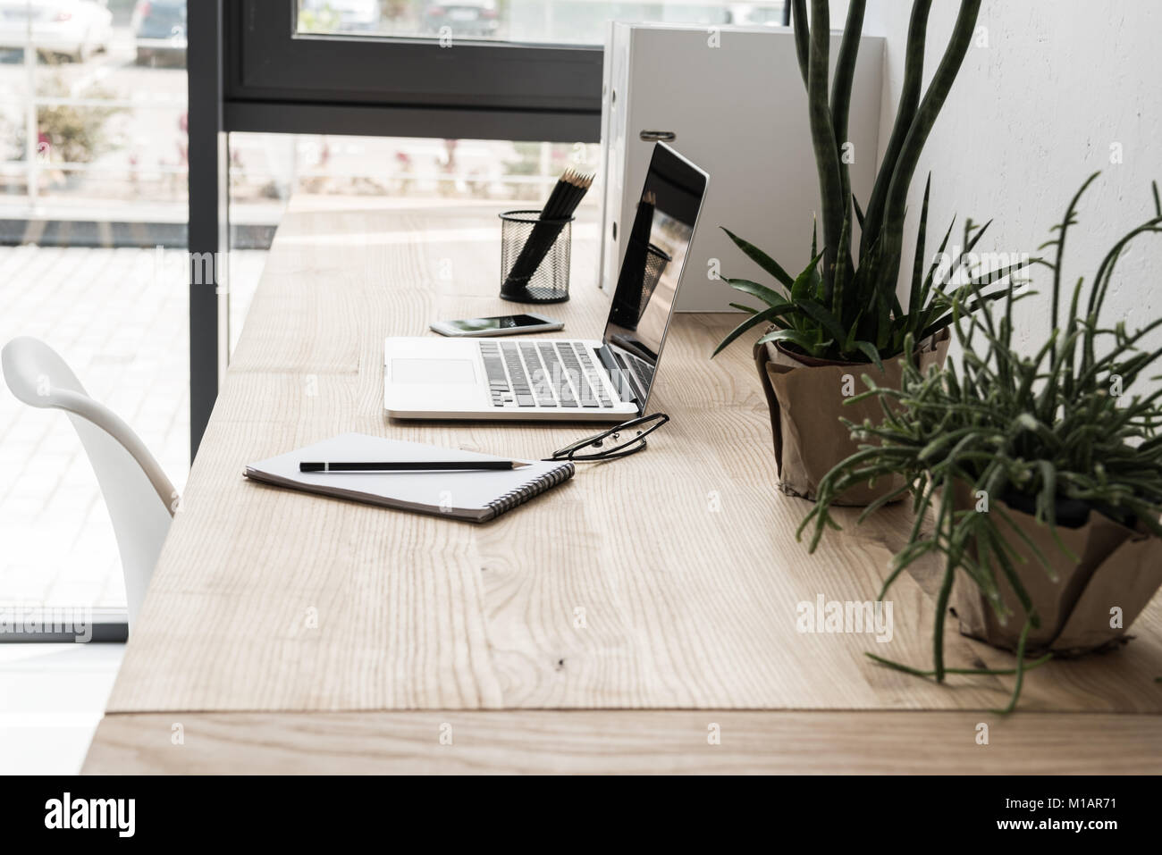 workplace with laptop computer Stock Photo - Alamy