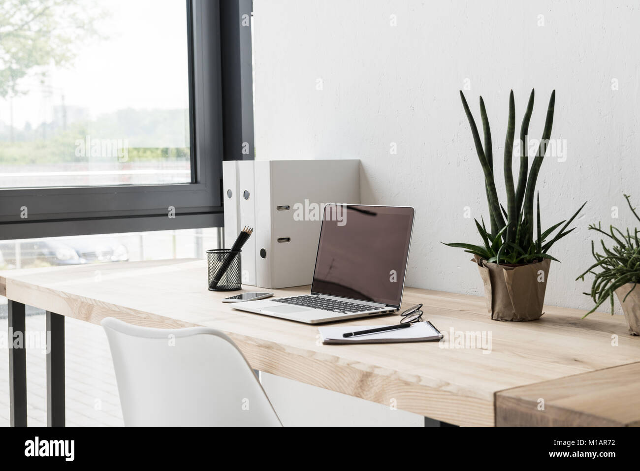 workplace with laptop computer Stock Photo - Alamy