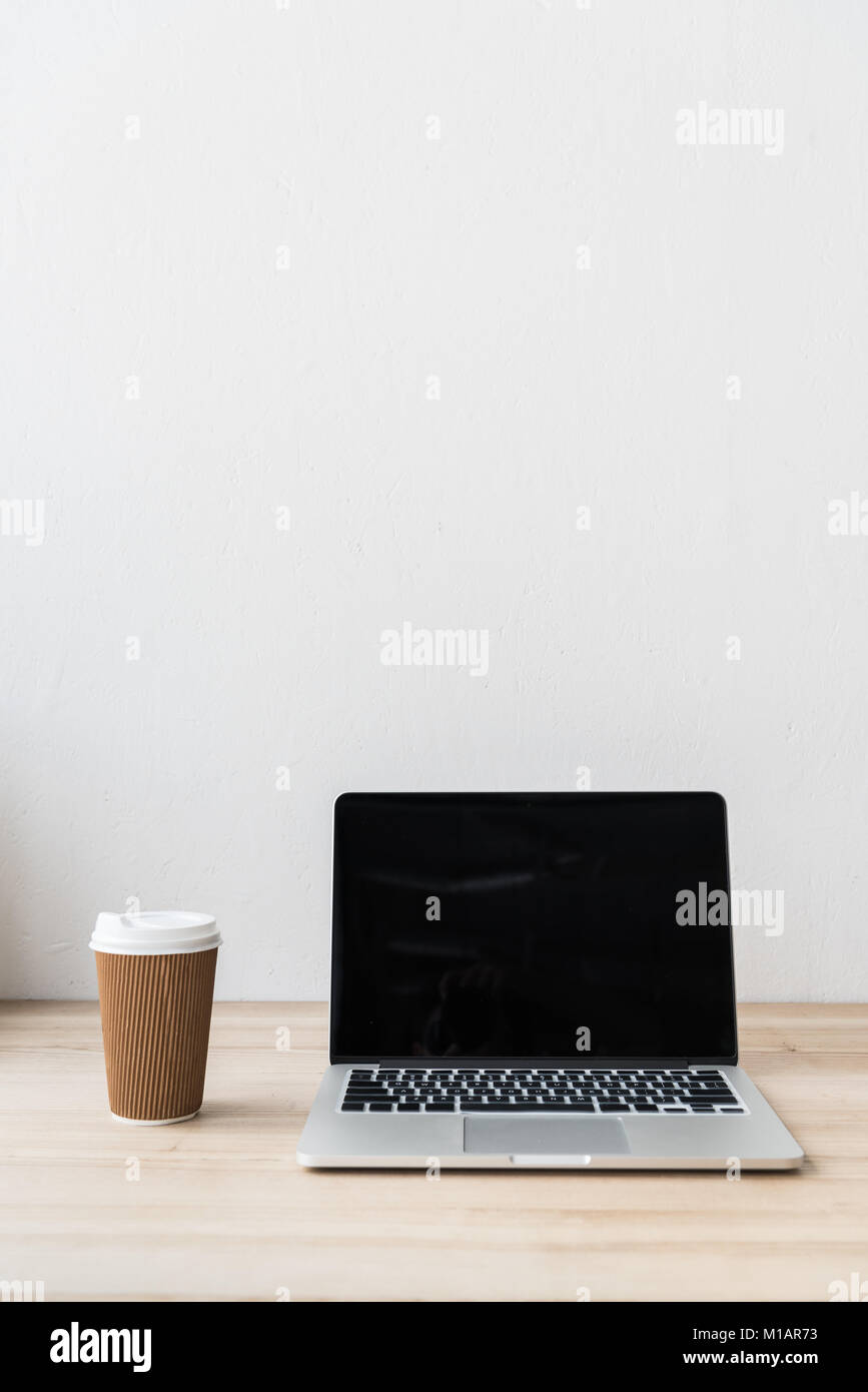 workplace with laptop computer Stock Photo - Alamy