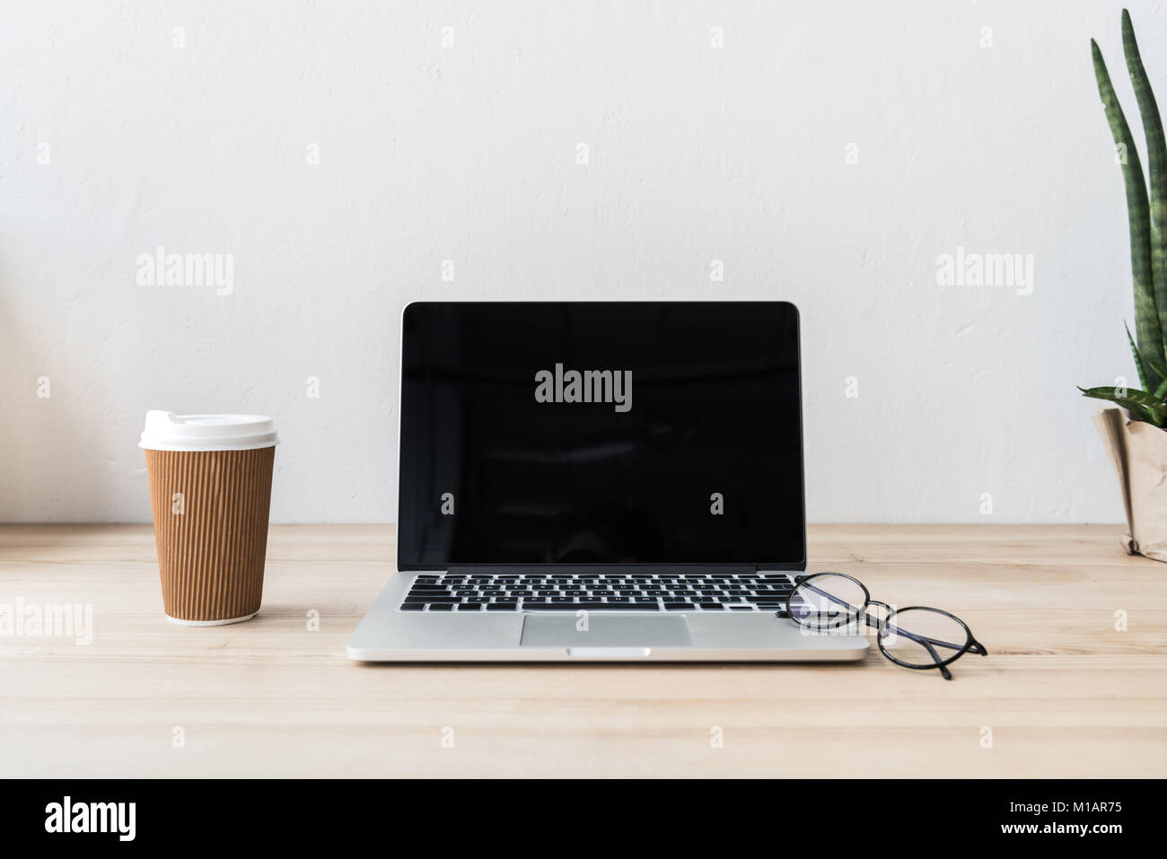 workplace with laptop computer Stock Photo - Alamy