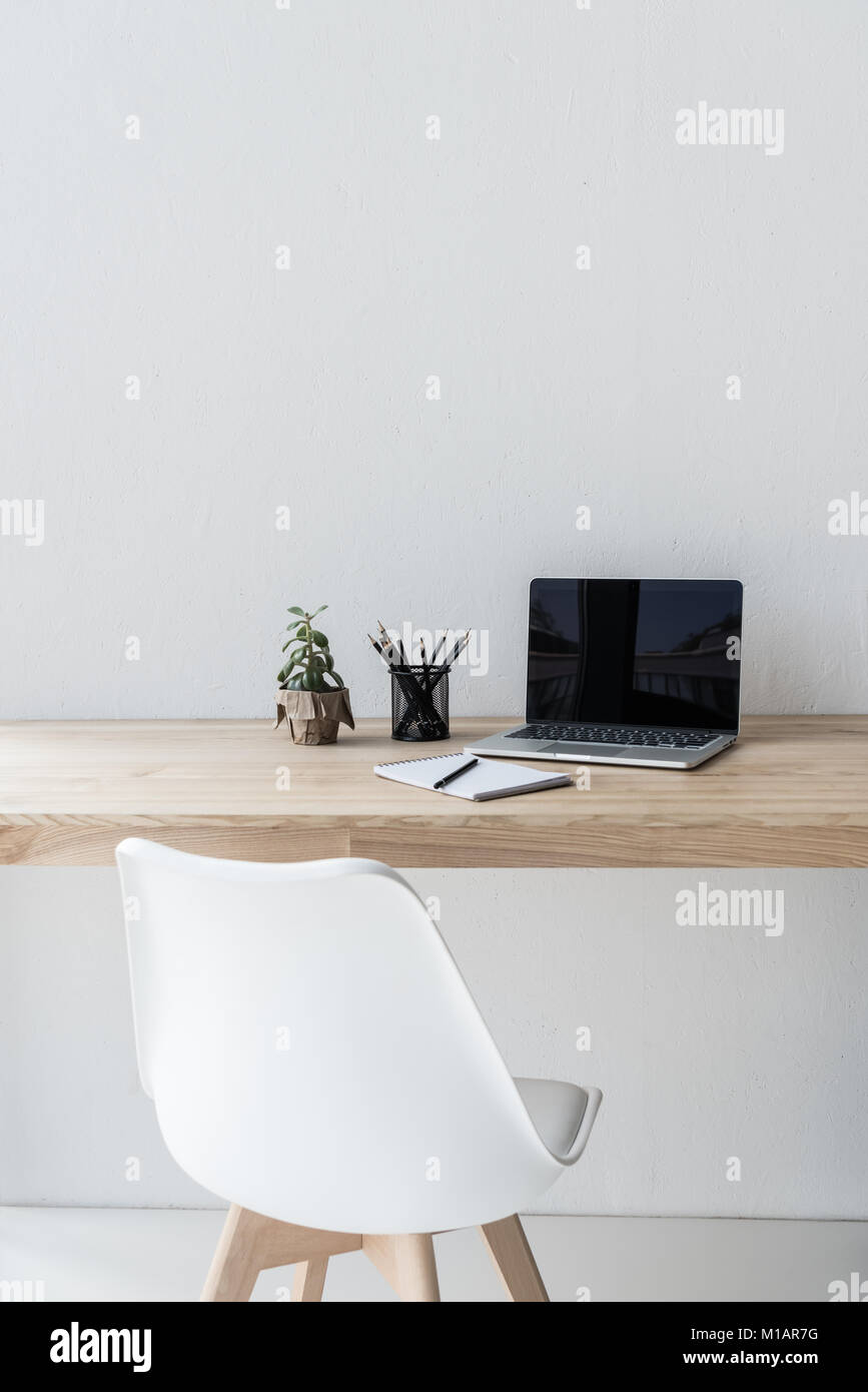 workplace with laptop computer Stock Photo - Alamy