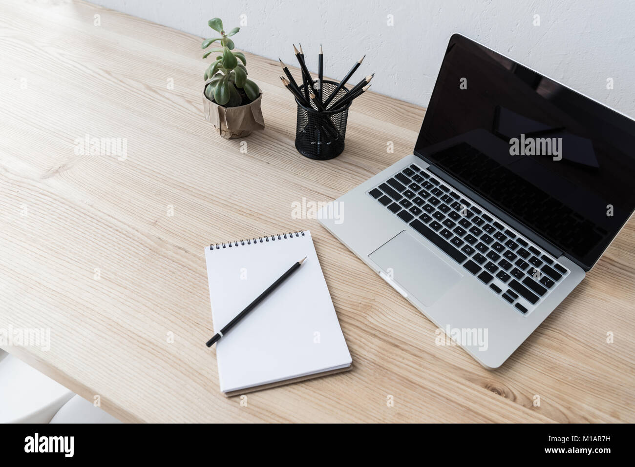 workplace with laptop computer Stock Photo - Alamy
