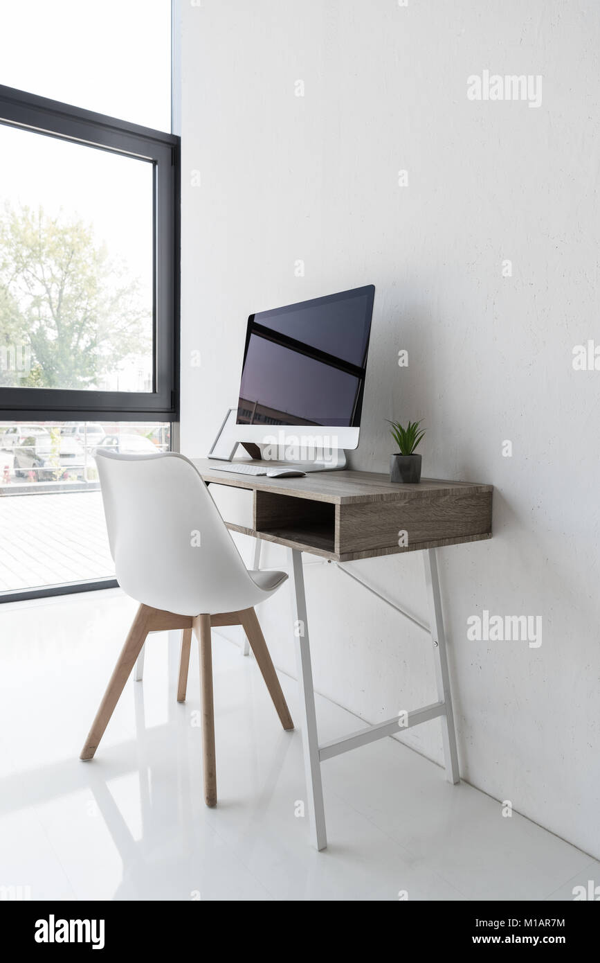workplace with computer in modern office Stock Photo - Alamy