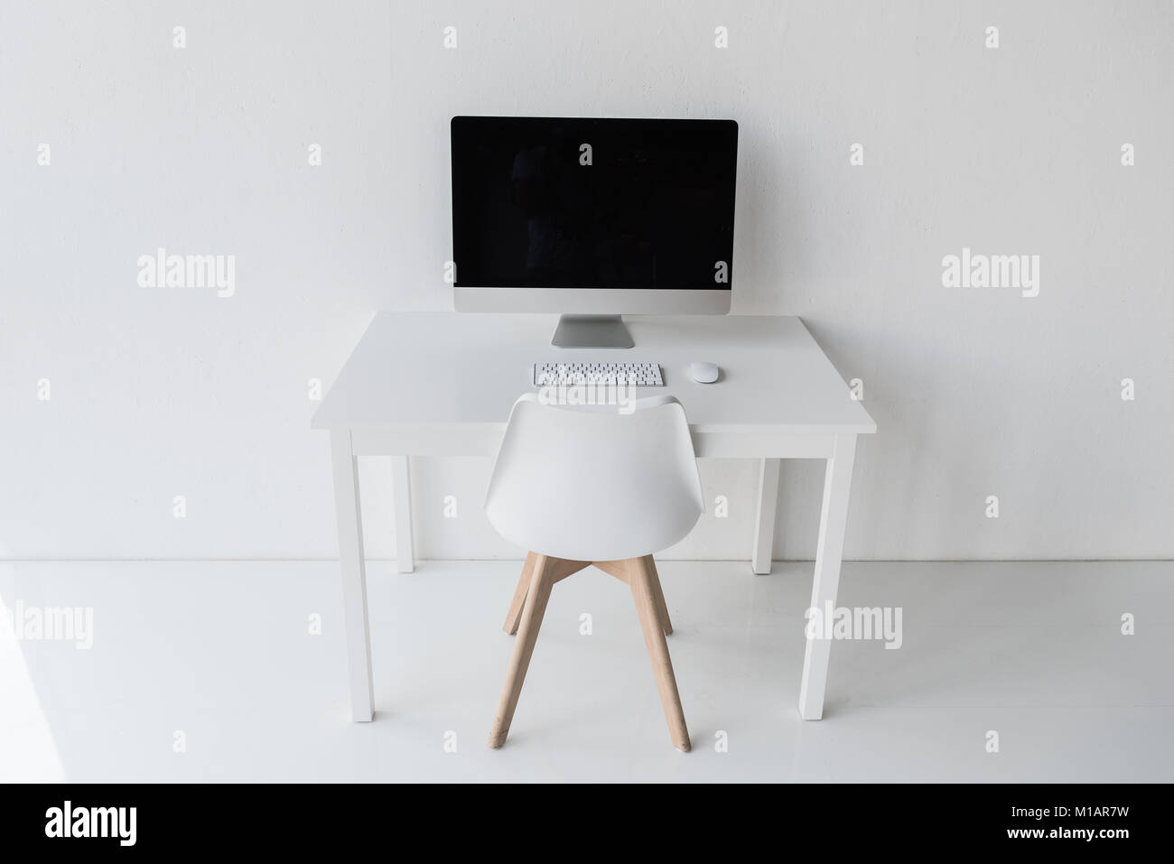 workplace with computer in modern office Stock Photo - Alamy