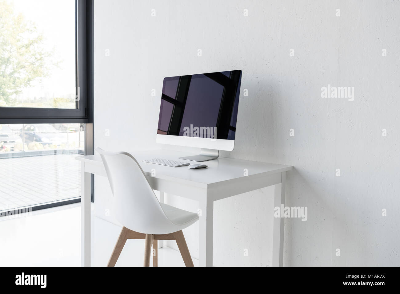workplace with computer in modern office Stock Photo - Alamy