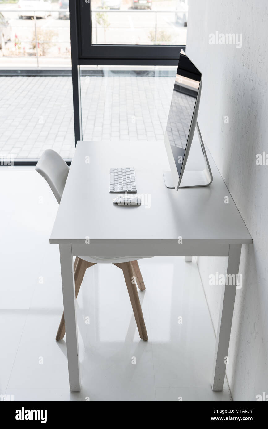 workplace with computer in modern office Stock Photo - Alamy