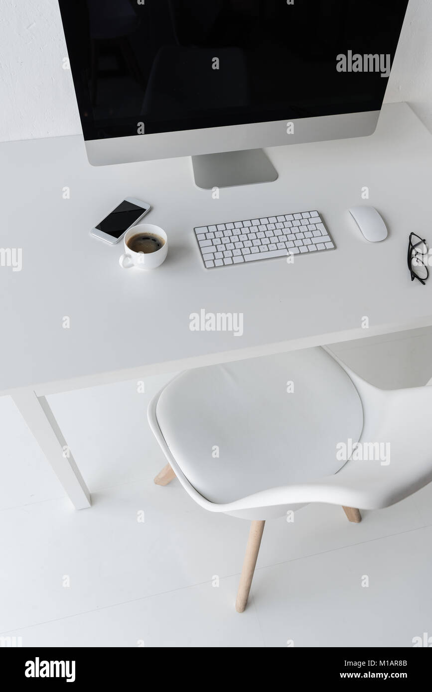 workplace with computer in modern office Stock Photo - Alamy