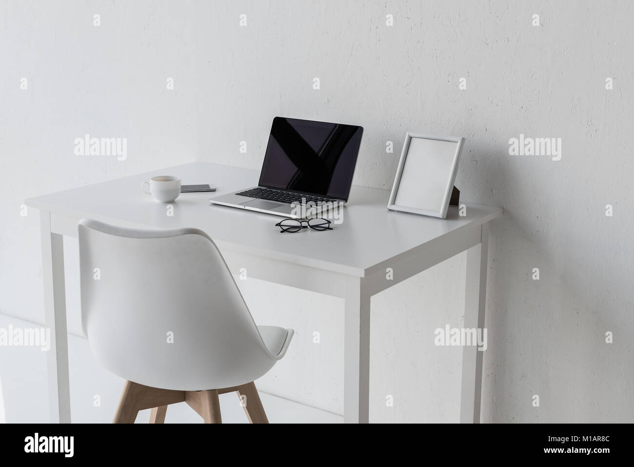 workplace with laptop computer Stock Photo - Alamy