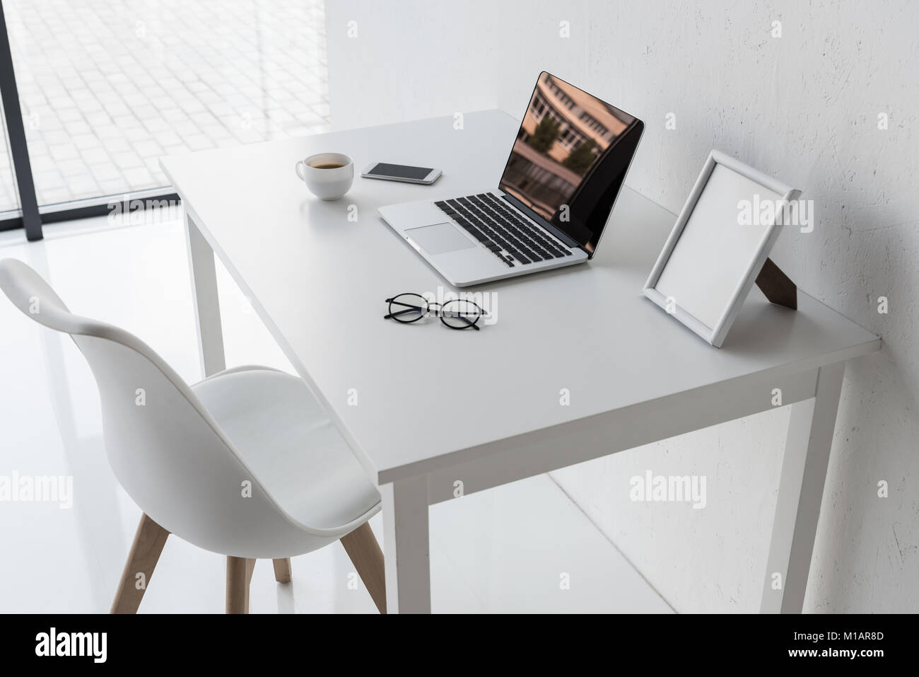 workplace with laptop computer Stock Photo - Alamy
