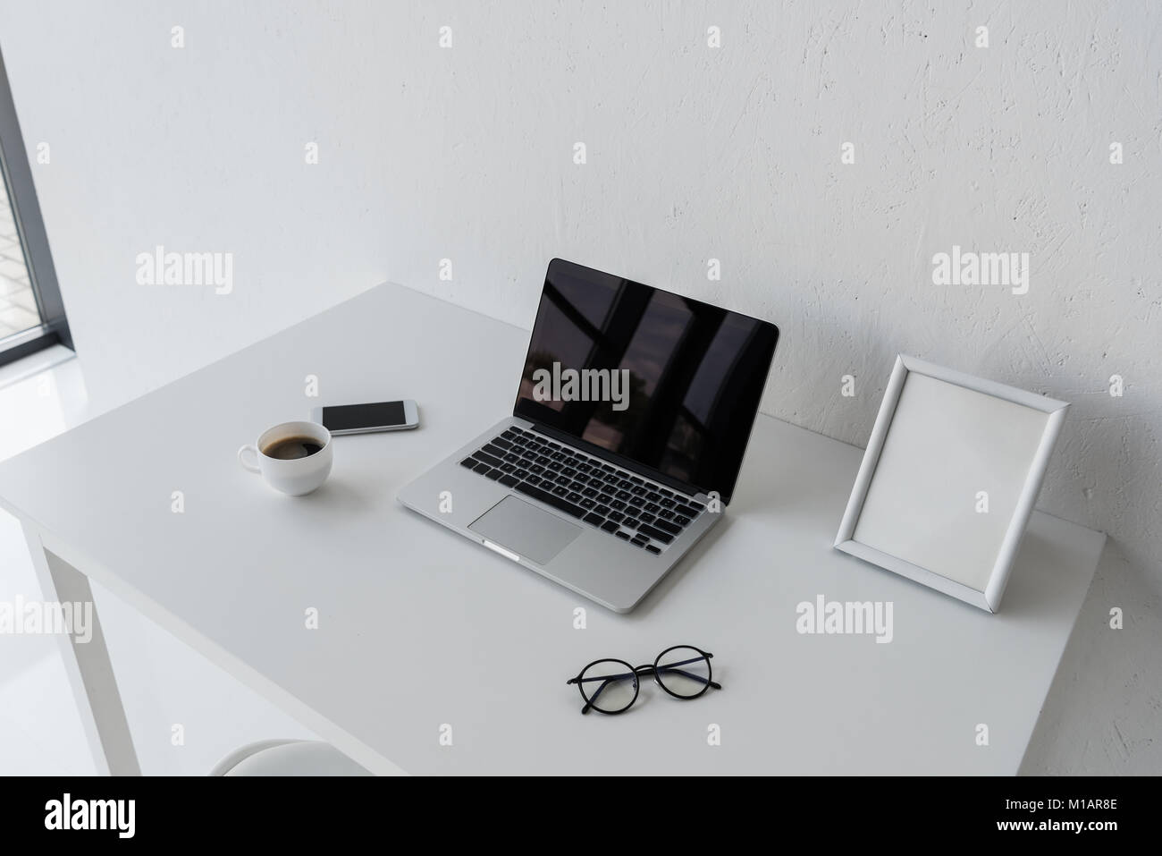workplace with laptop computer Stock Photo - Alamy