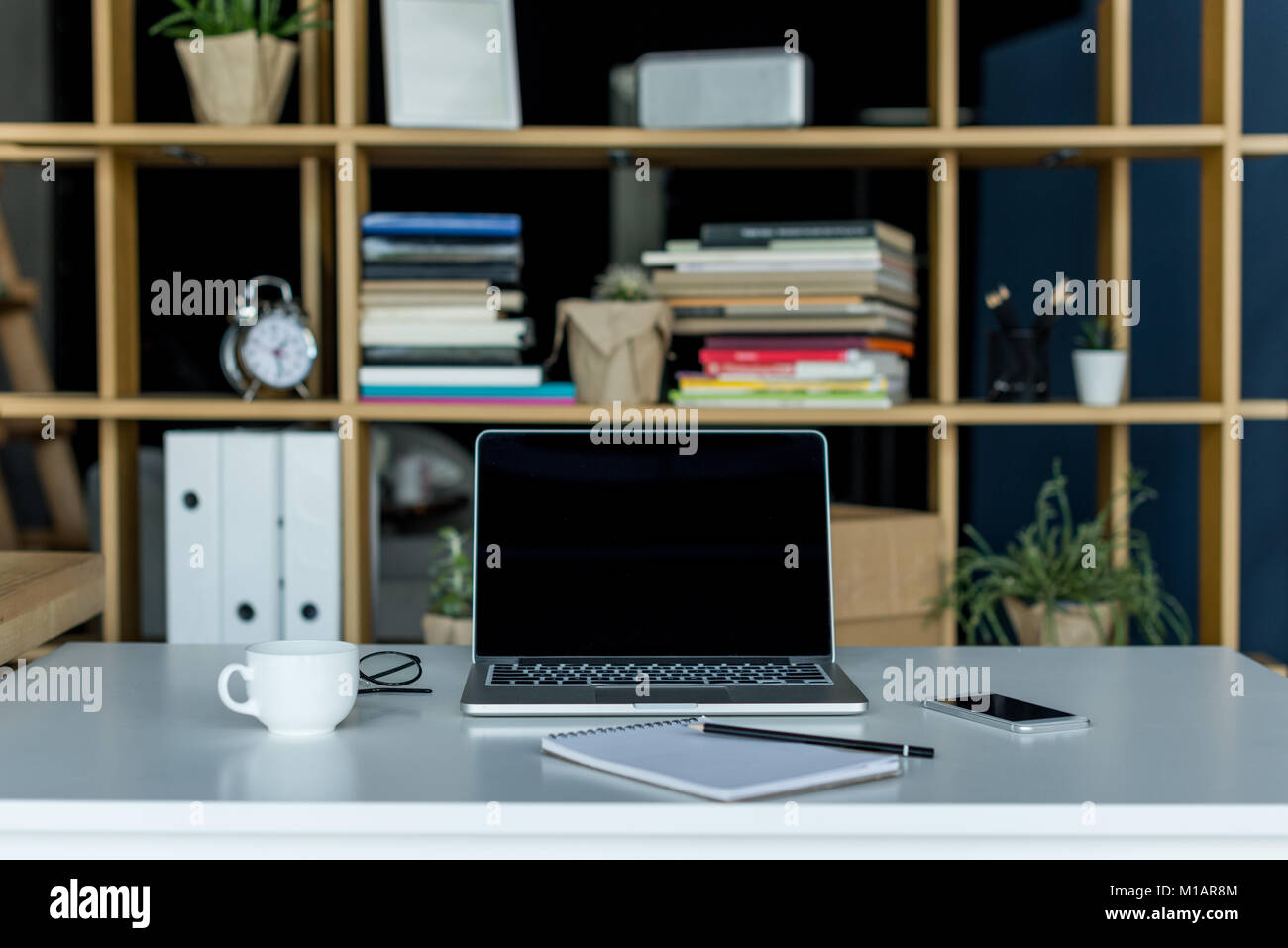 workplace with laptop computer Stock Photo - Alamy