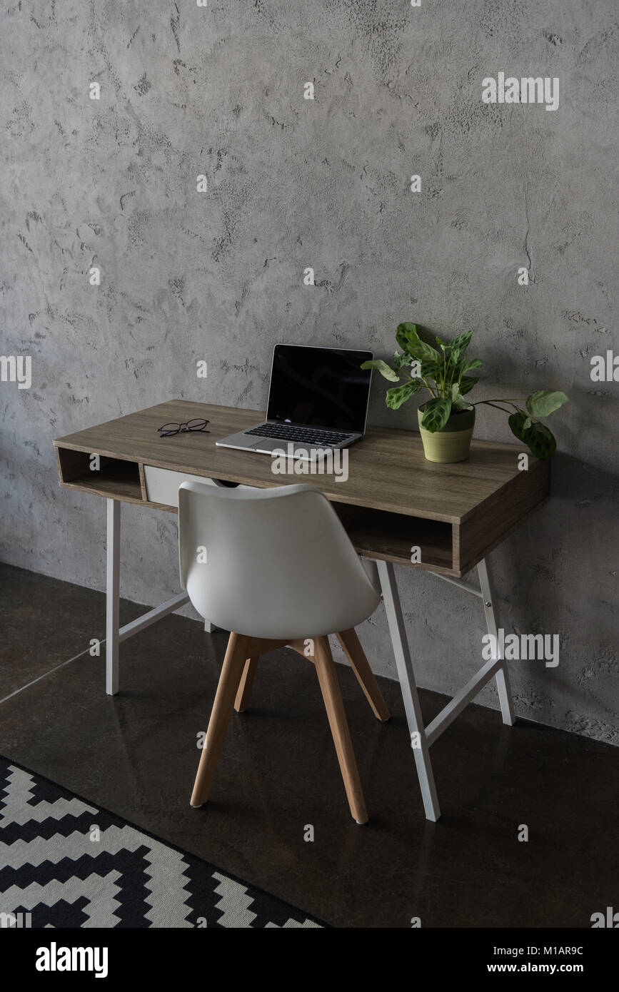 workplace with laptop computer Stock Photo - Alamy