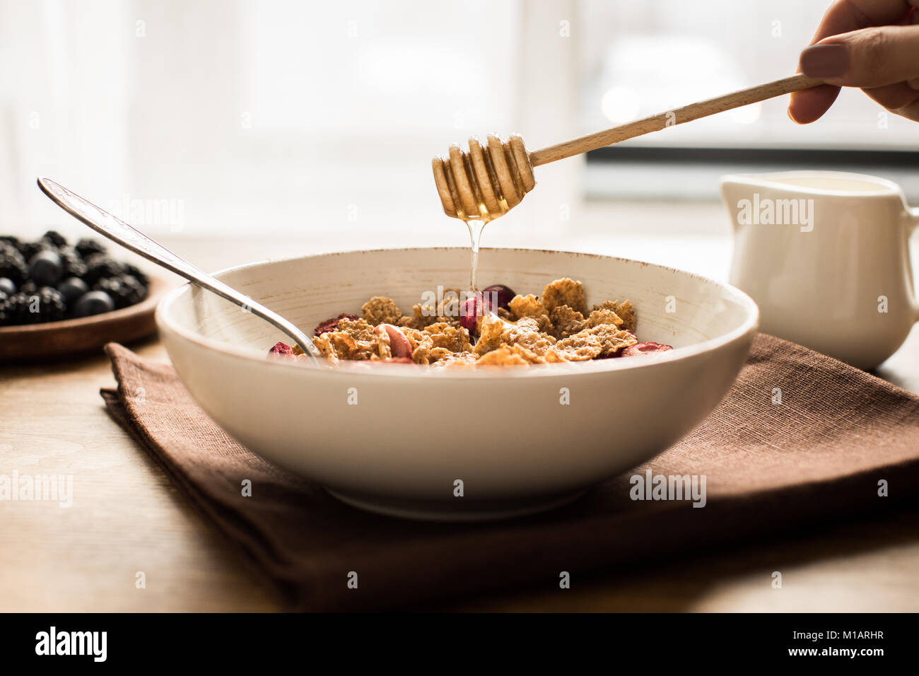 Breakfast sweet honey spoon hi-res stock photography and images - Alamy