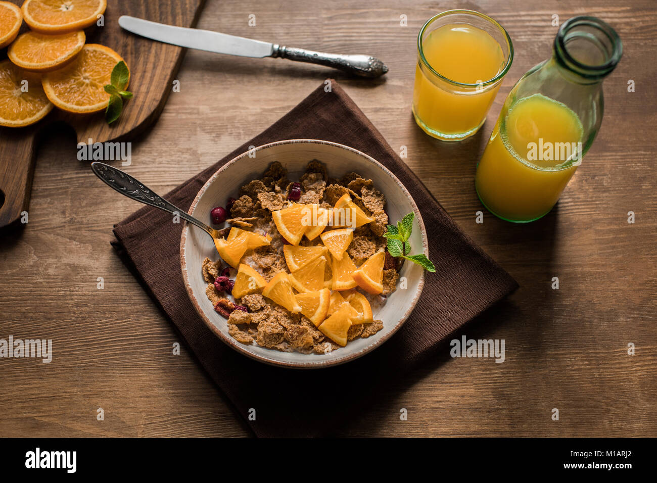 corn flakes with orange slices Stock Photo - Alamy