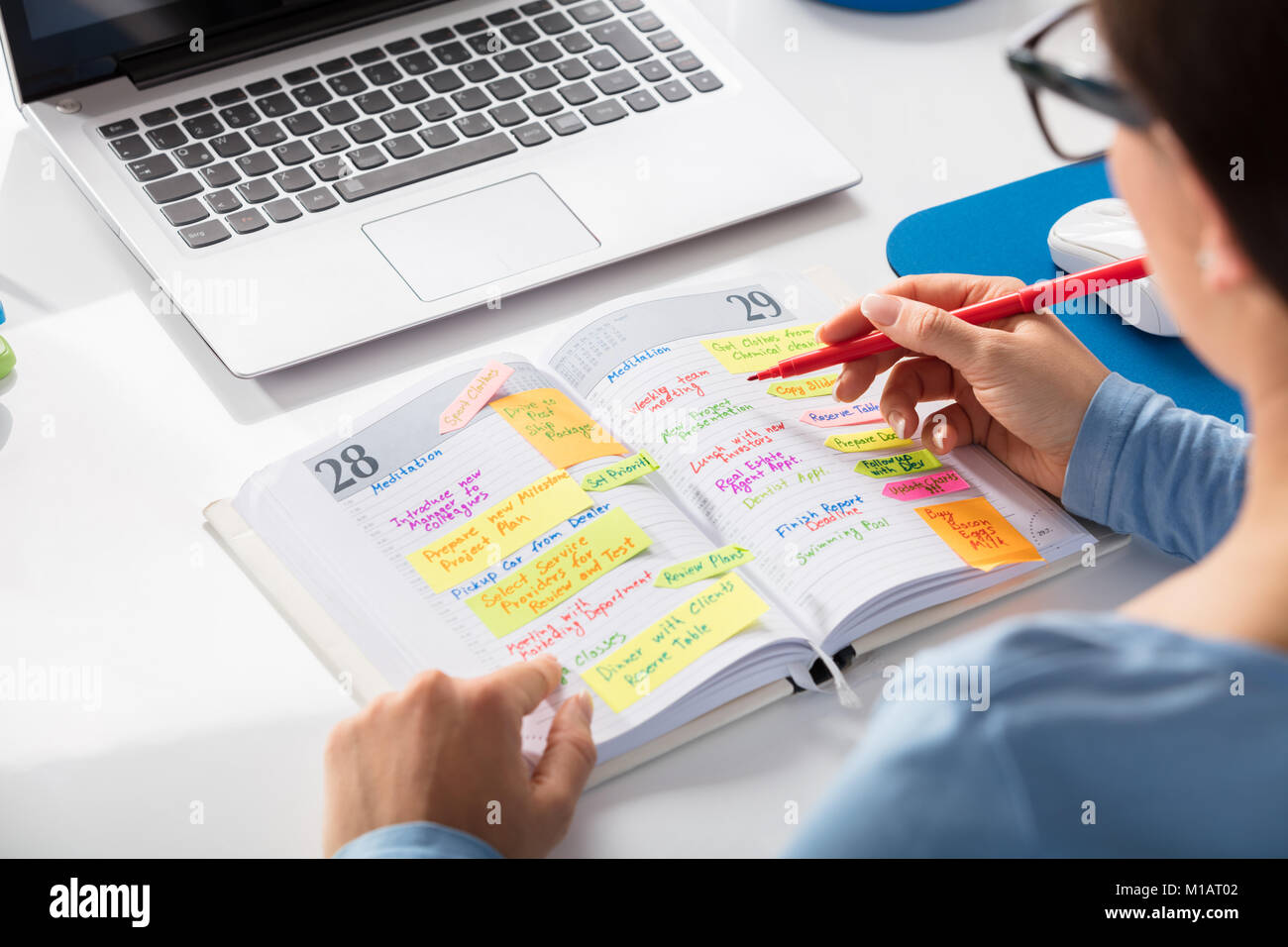 Business lady marking schedule hi-res stock photography and images - Alamy