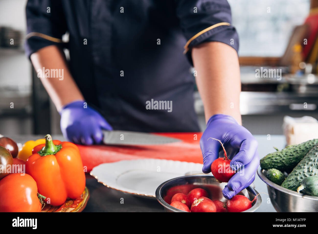 cropped shot of chef taking fresh radish for salad Stock Photo - Alamy