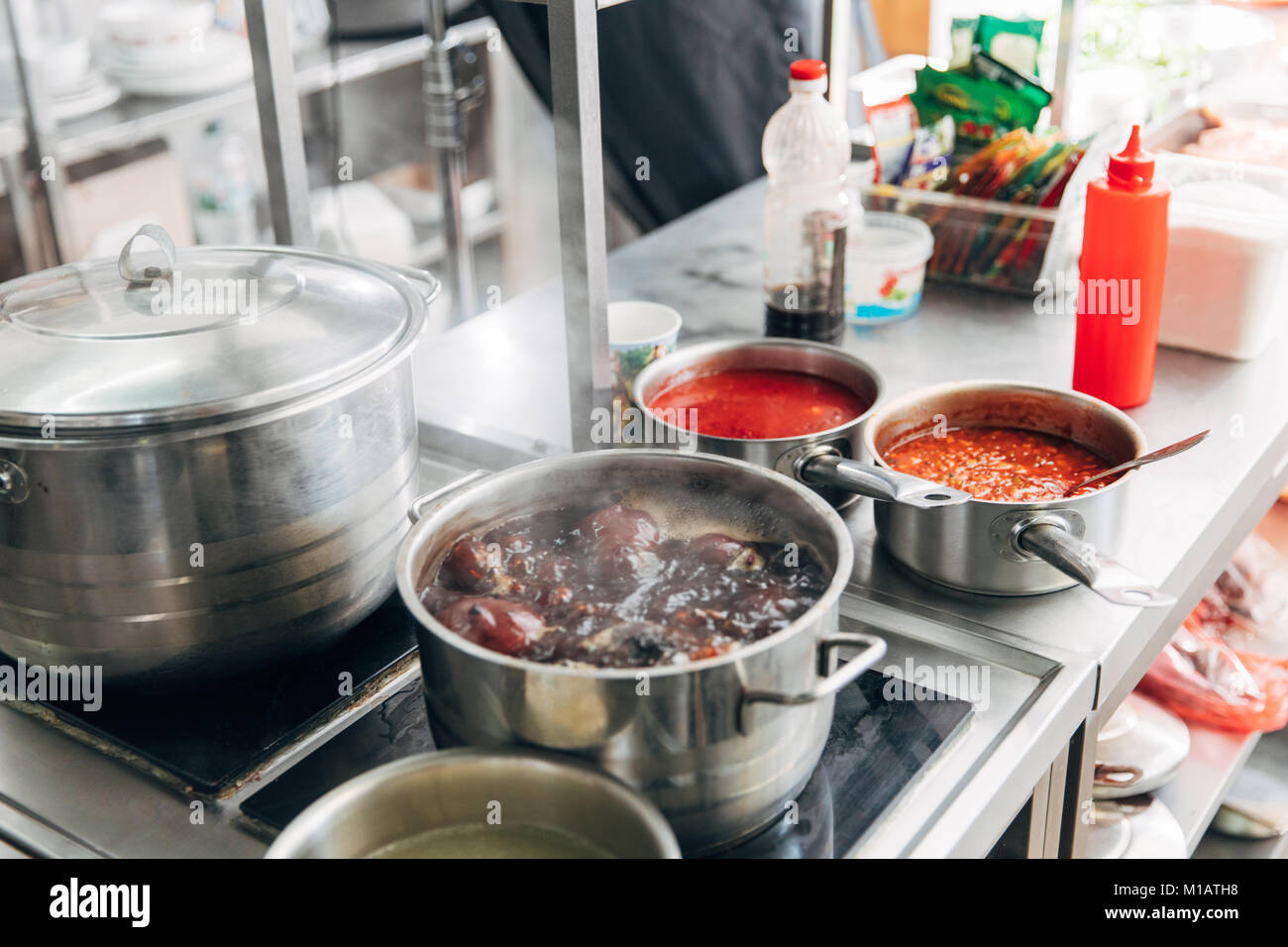 delicious soup boiling in pan at restaurant kitchen Stock Photo - Alamy