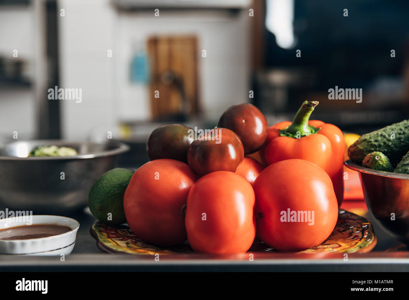 various fresh vegetables on table at restaurant kitchen Stock Photo - Alamy