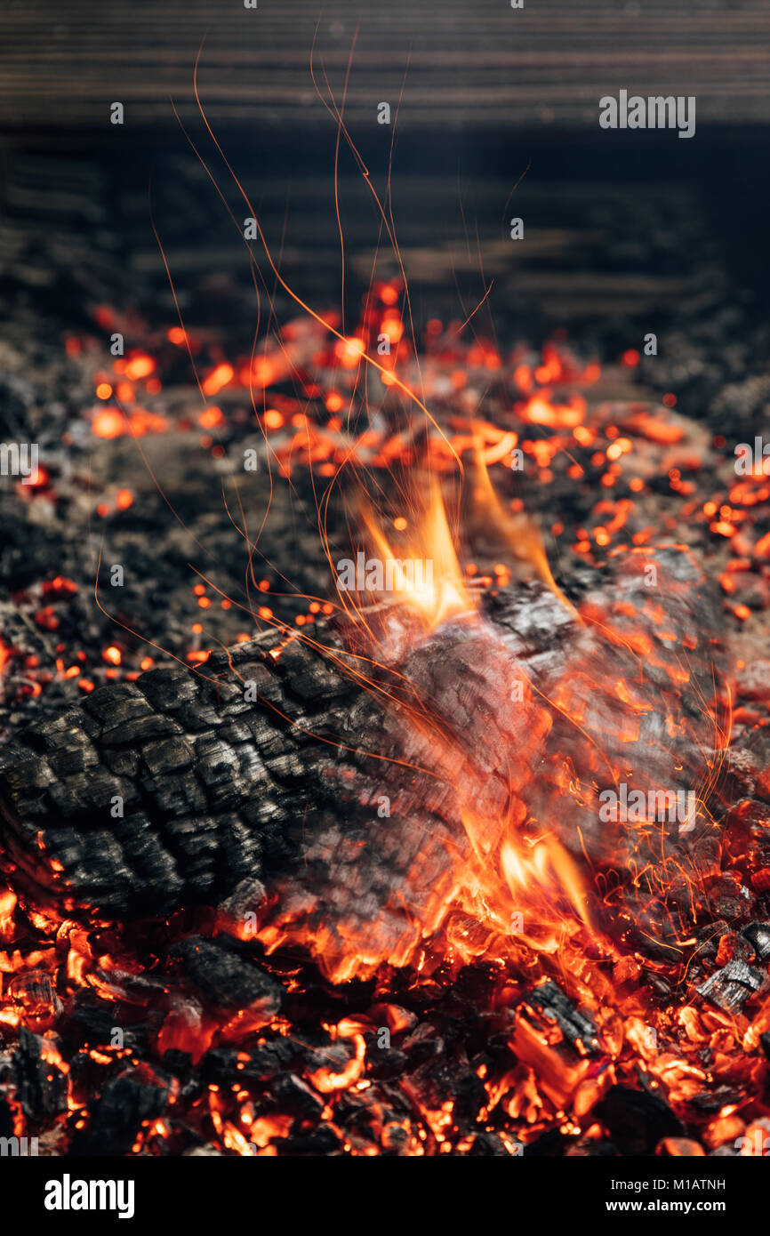 close-up shot of log burning in bonfire Stock Photo - Alamy