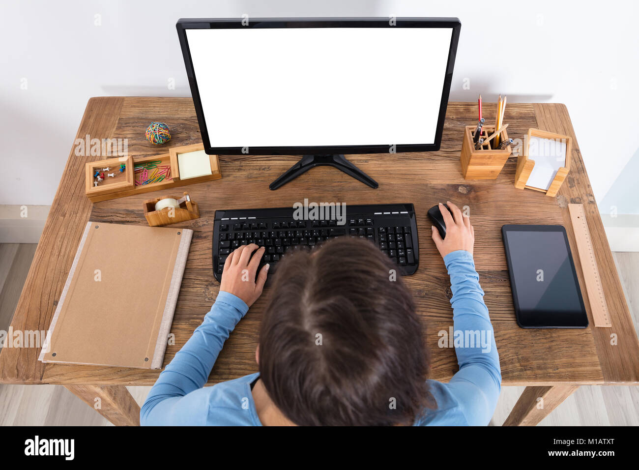 Elevated View Of A Woman Using Computer At Home Stock Photo - Alamy