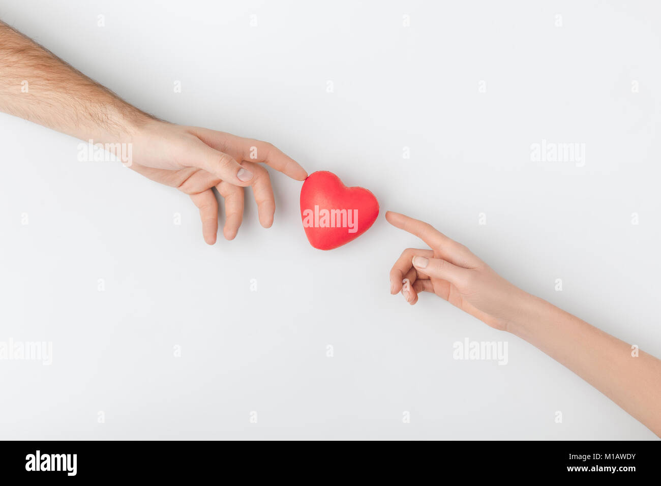 top view of hands touching red heart isolated on white background Stock ...
