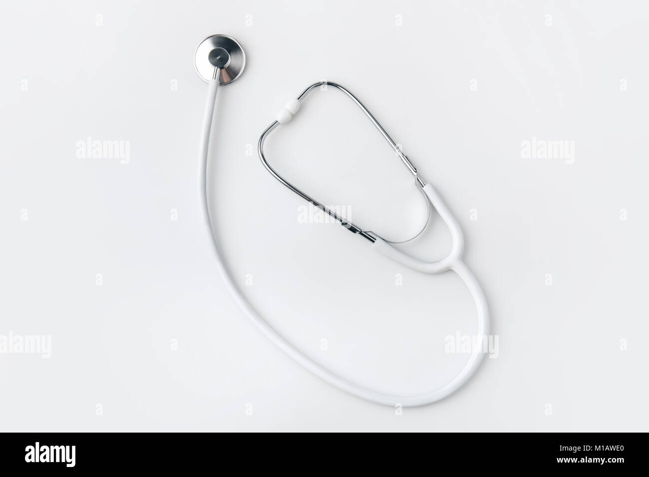 stethoscope laying isolated on white background Stock Photo - Alamy