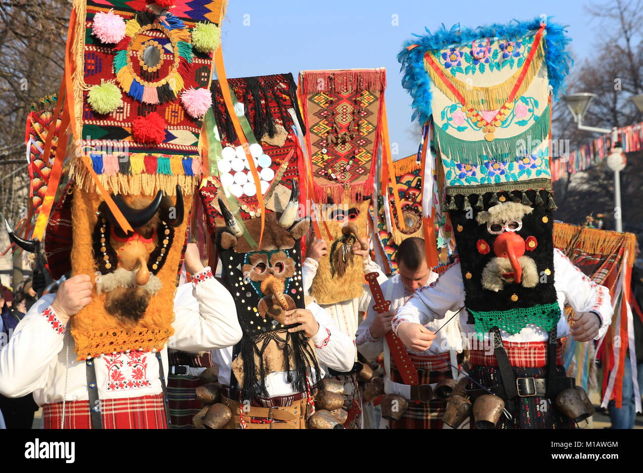 People with mask called Kukeri dance and perform to scare the evil ...