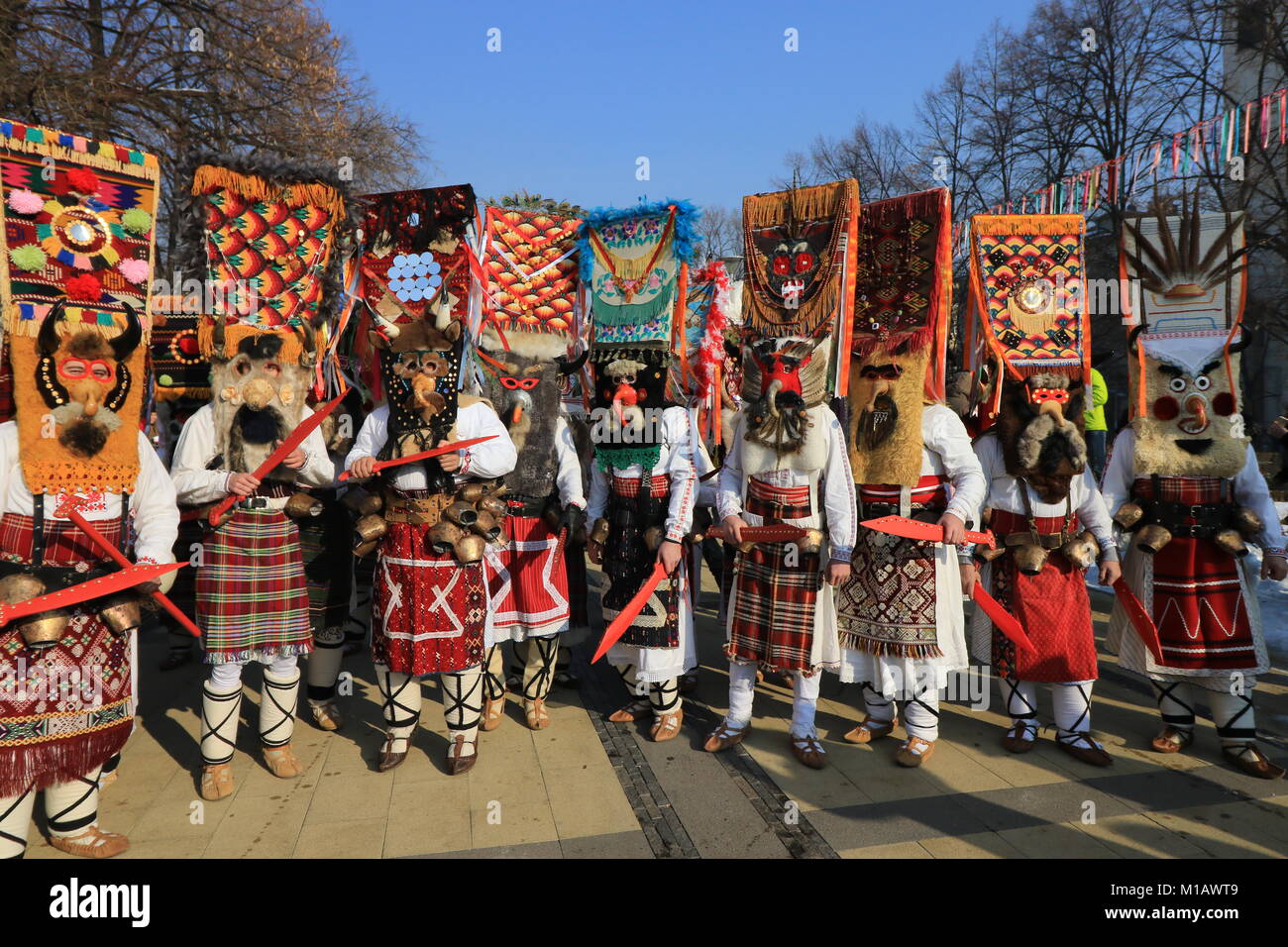 People with mask called Kukeri dance and perform to scare the evil ...