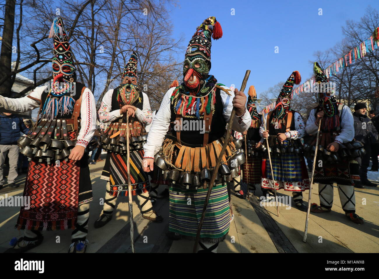 People with mask called Kukeri dance and perform to scare the evil ...