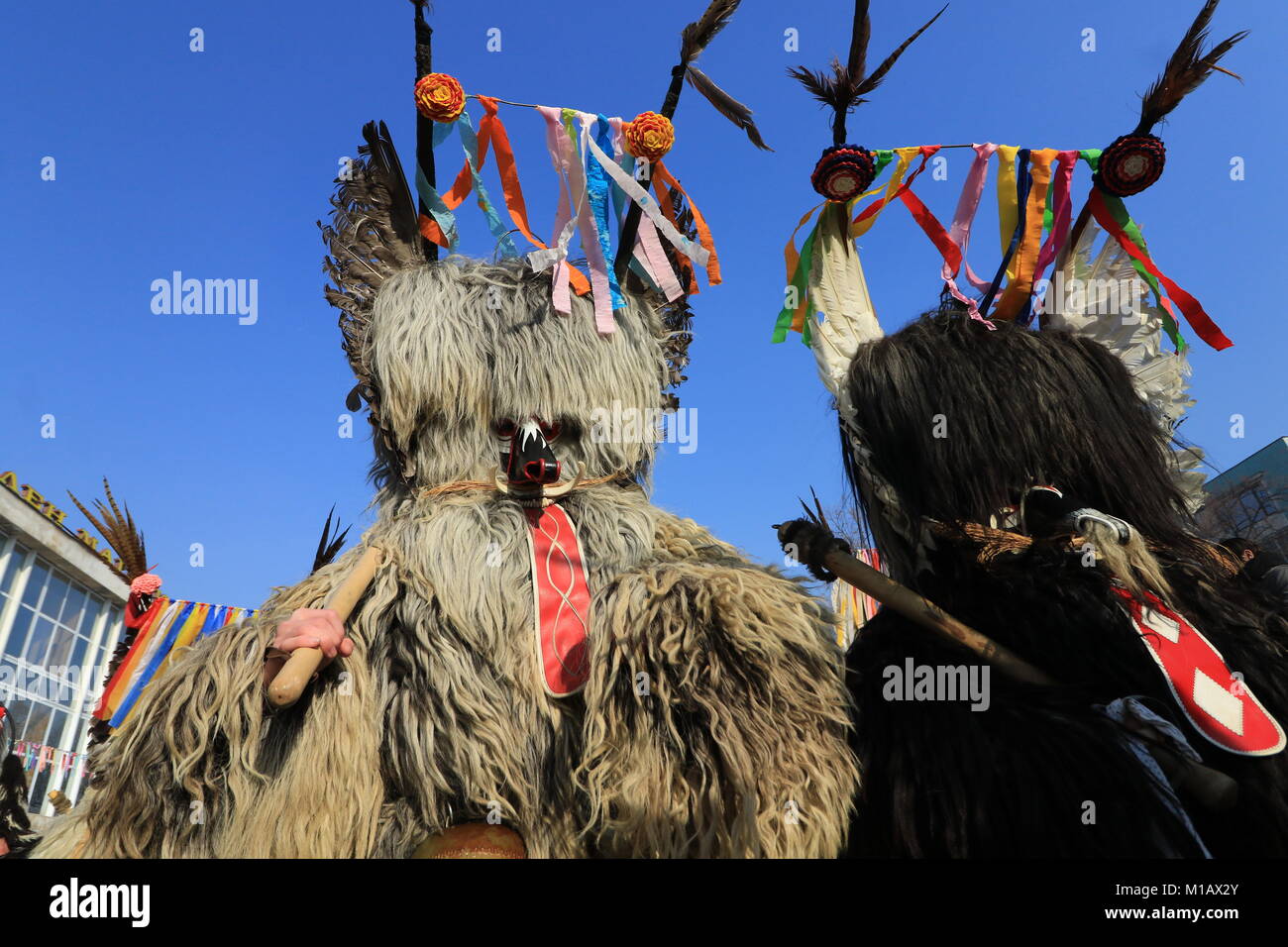People with mask called Kukeri dance and perform to scare the evil ...