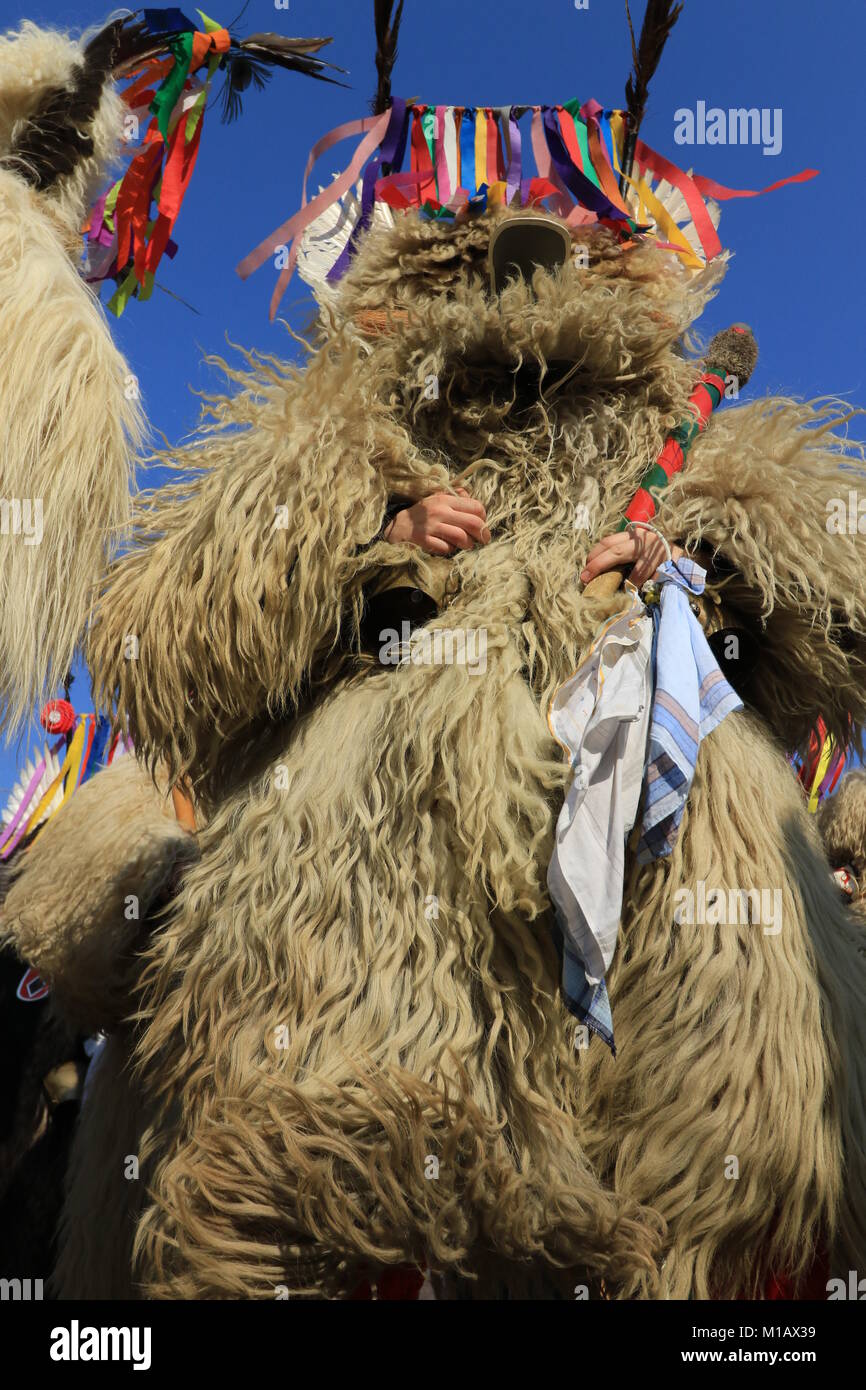 People with mask called Kukeri dance and perform to scare the evil ...