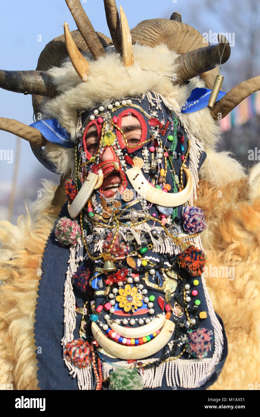 People with mask called Kukeri dance and perform to scare the evil ...