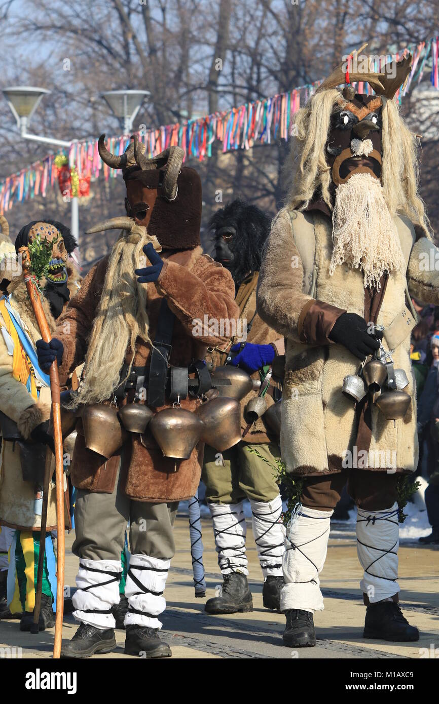 People with mask called Kukeri dance and perform to scare the evil ...
