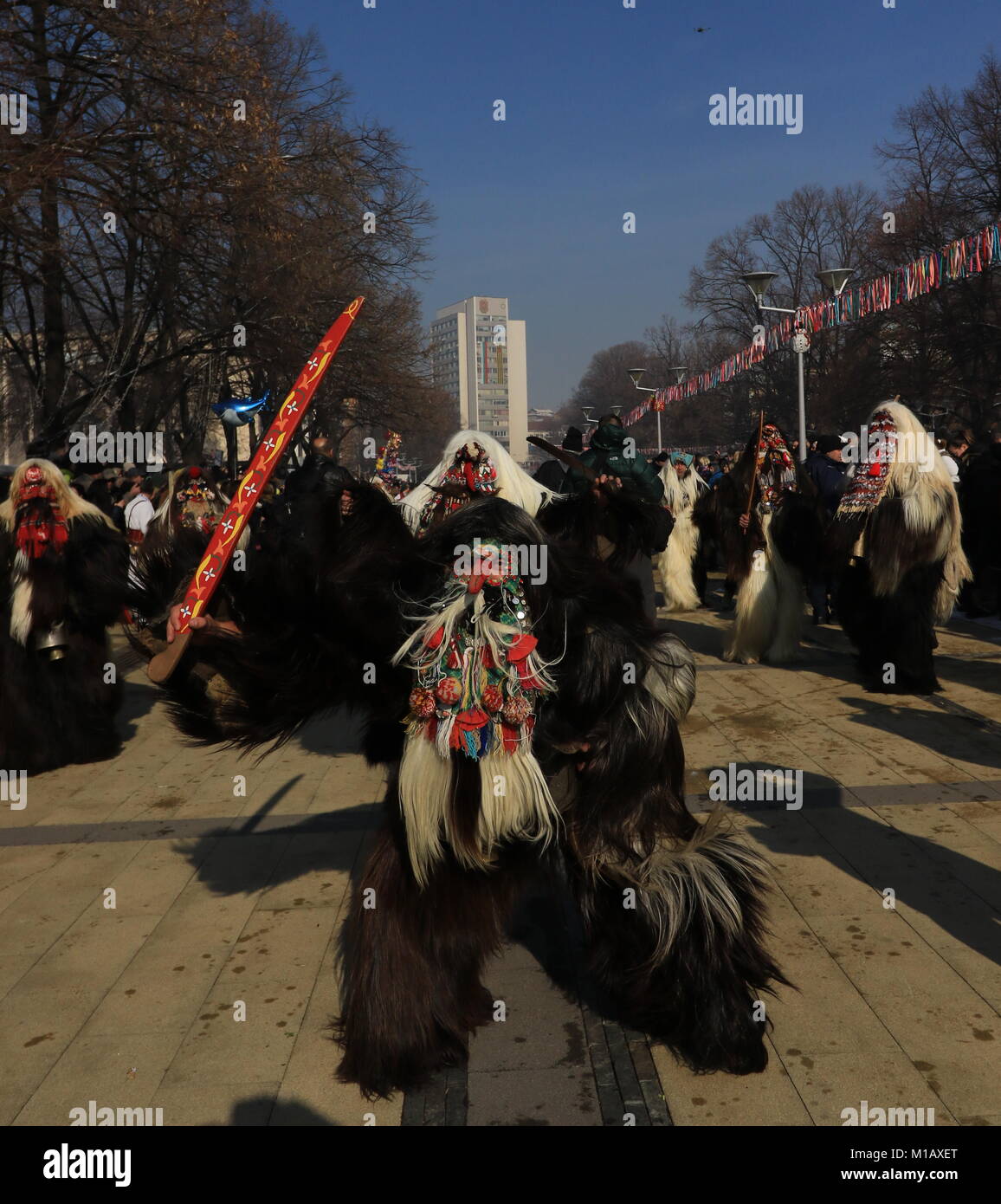 People with mask called Kukeri dance and perform to scare the evil ...