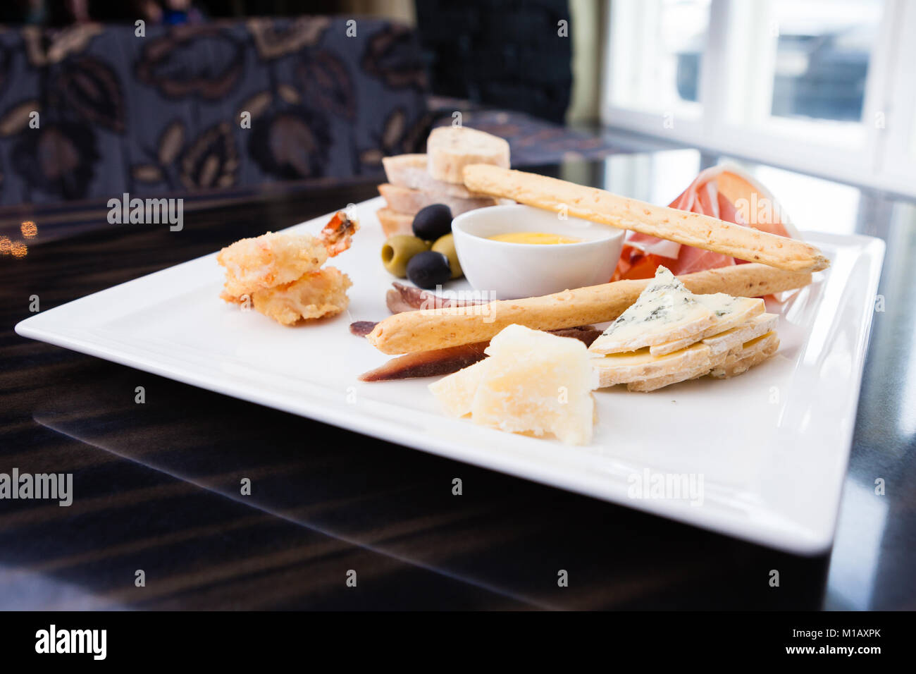 Tapas platter with ham Stock Photo - Alamy