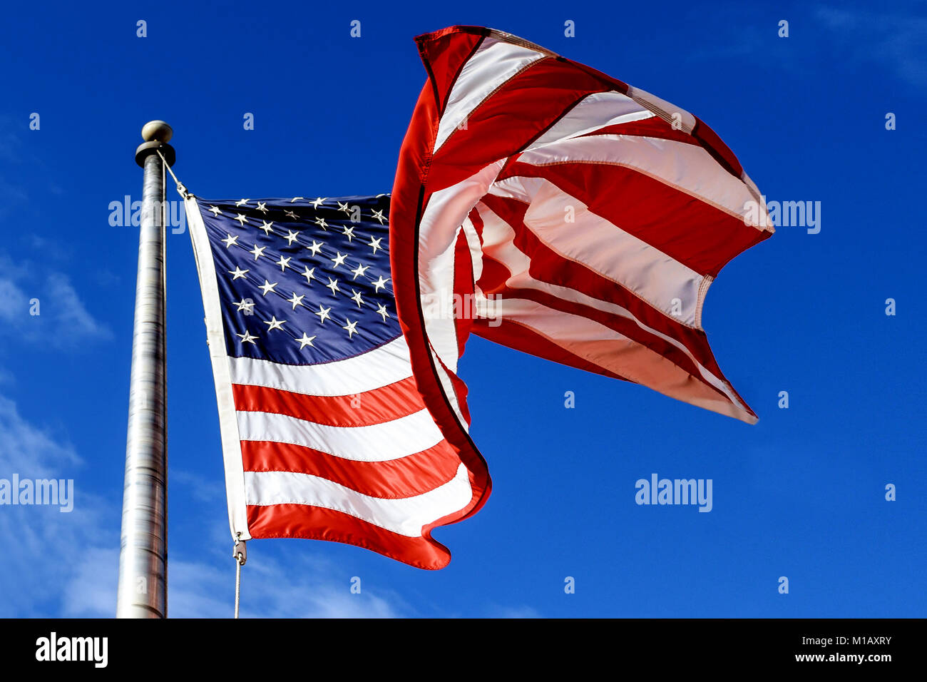 USA Flag over blue sky waving american flag over the blue sky Stock ...