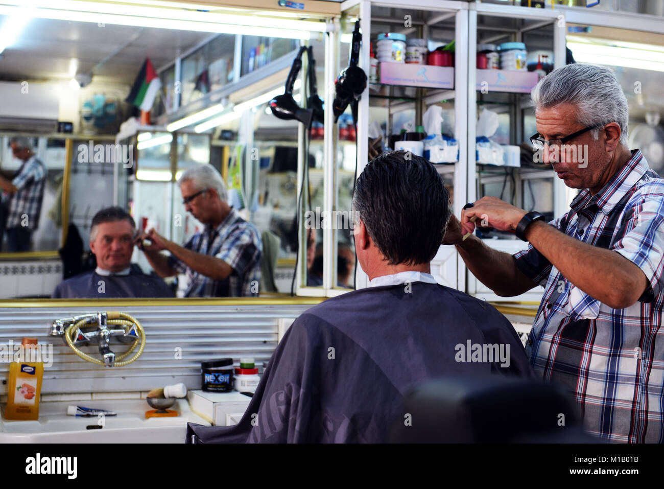 At a local Jordanian barbershop Stock Photo - Alamy