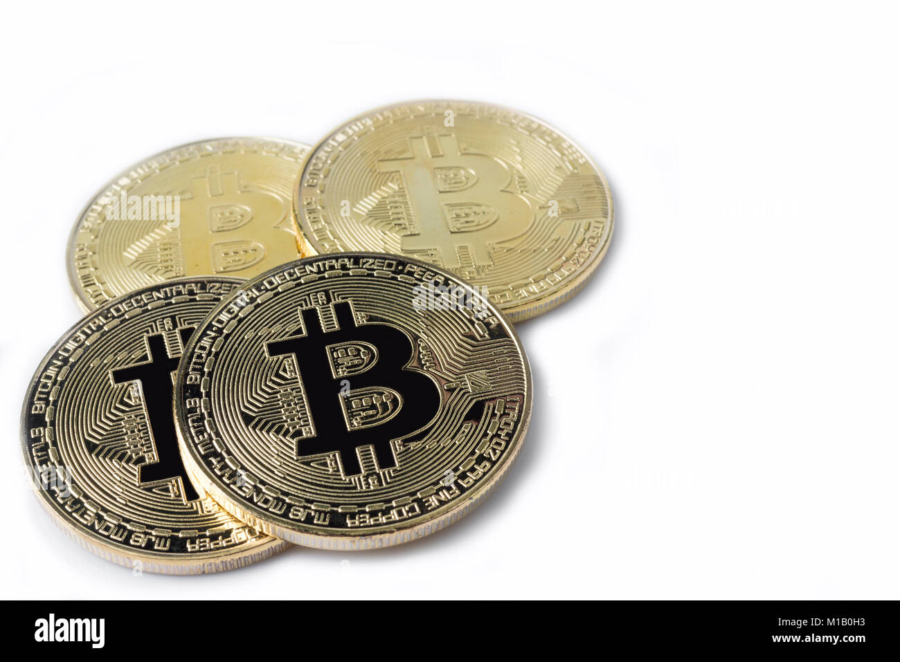 Four bitcoin on a white background. Modern currency, a cryptocurrency ...