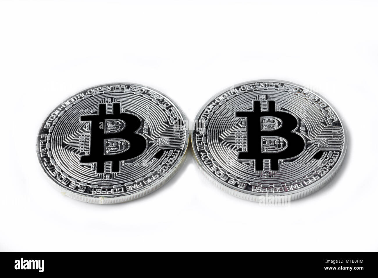 Two silver bitcoins on a white background. Modern cryptocurrency Stock ...
