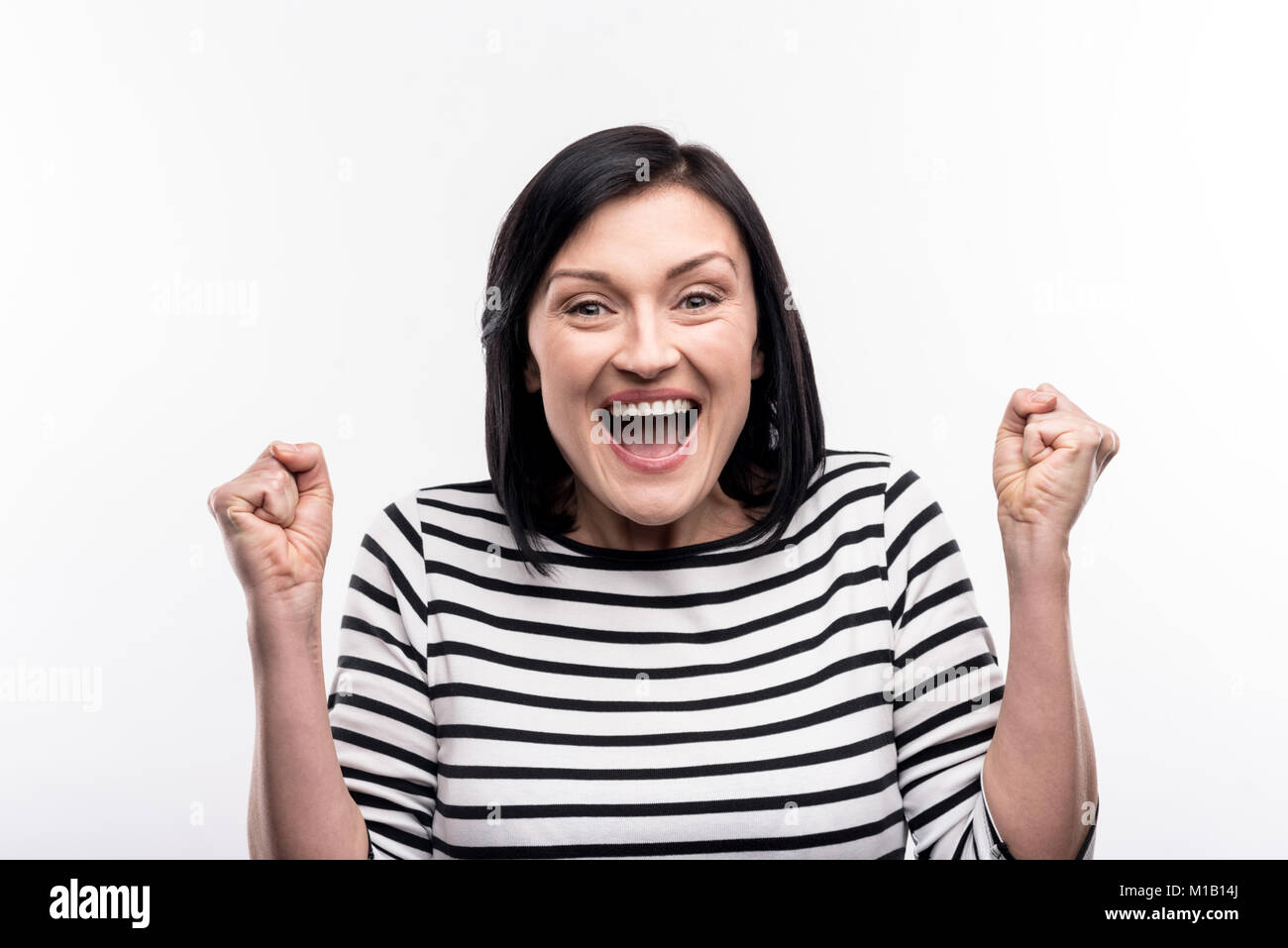 Woman shouting joyfully in hi-res stock photography and images - Alamy