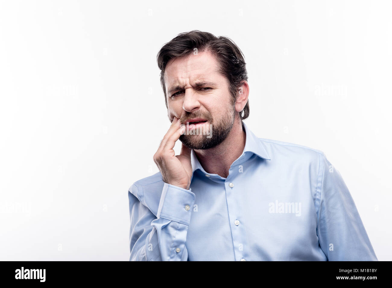 Wince pain hi-res stock photography and images - Alamy