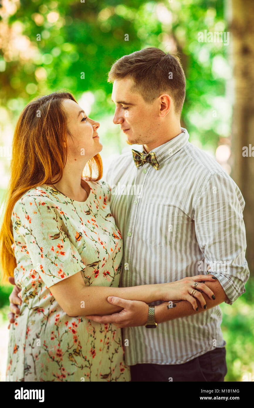 Beautiful couple on a natural background Stock Photo - Alamy